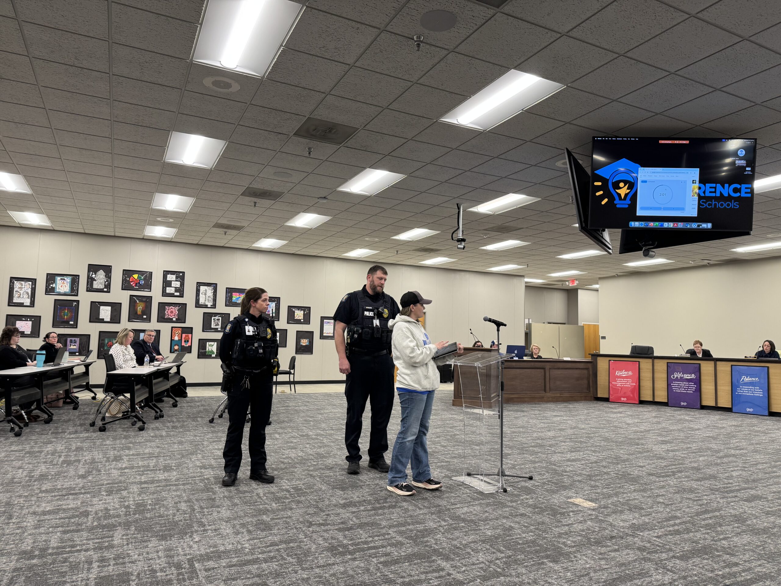 Public commenter escorted out of Lawrence school board meeting after ...